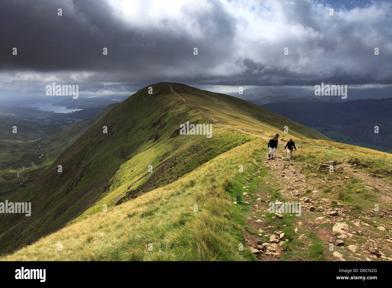 Adult walkers on Great Rigg Fell, Fairfield Horseshoe ridge, cumbrian ...