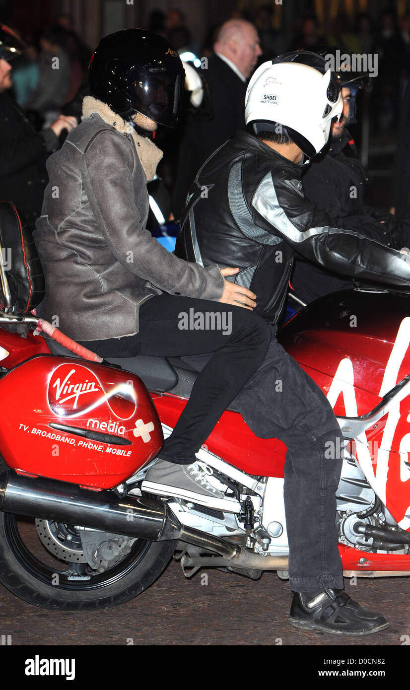 Russell Brand (L) arriving by motorcycle Despicable Me - UK film ...