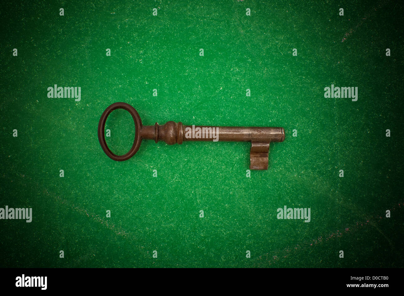 Vintage house key on a green chalkboard Stock Photo - Alamy