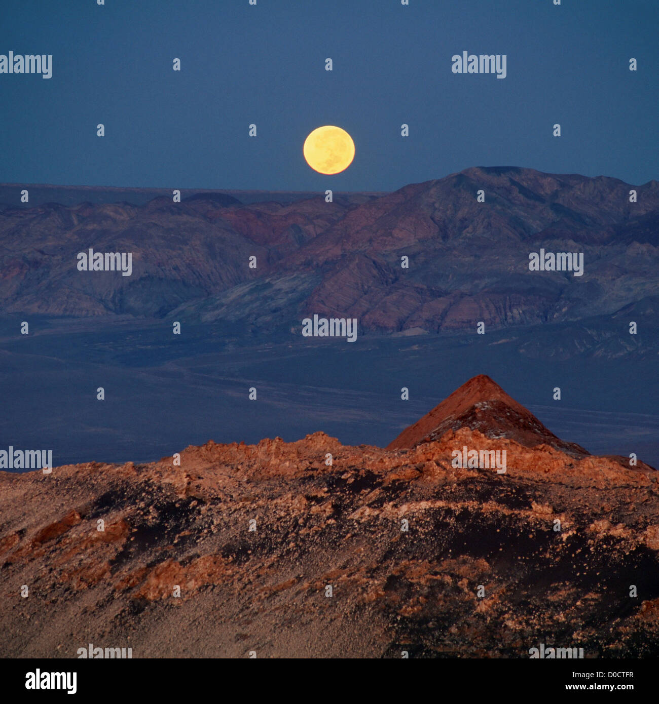 The Full Moon Rises Above the Stark Formations of Chile's Valley of the ...