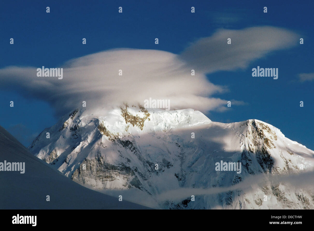 Lenticular Cloud Cap Engulfs the Summit Ramparts of Mount Hunter Stock ...