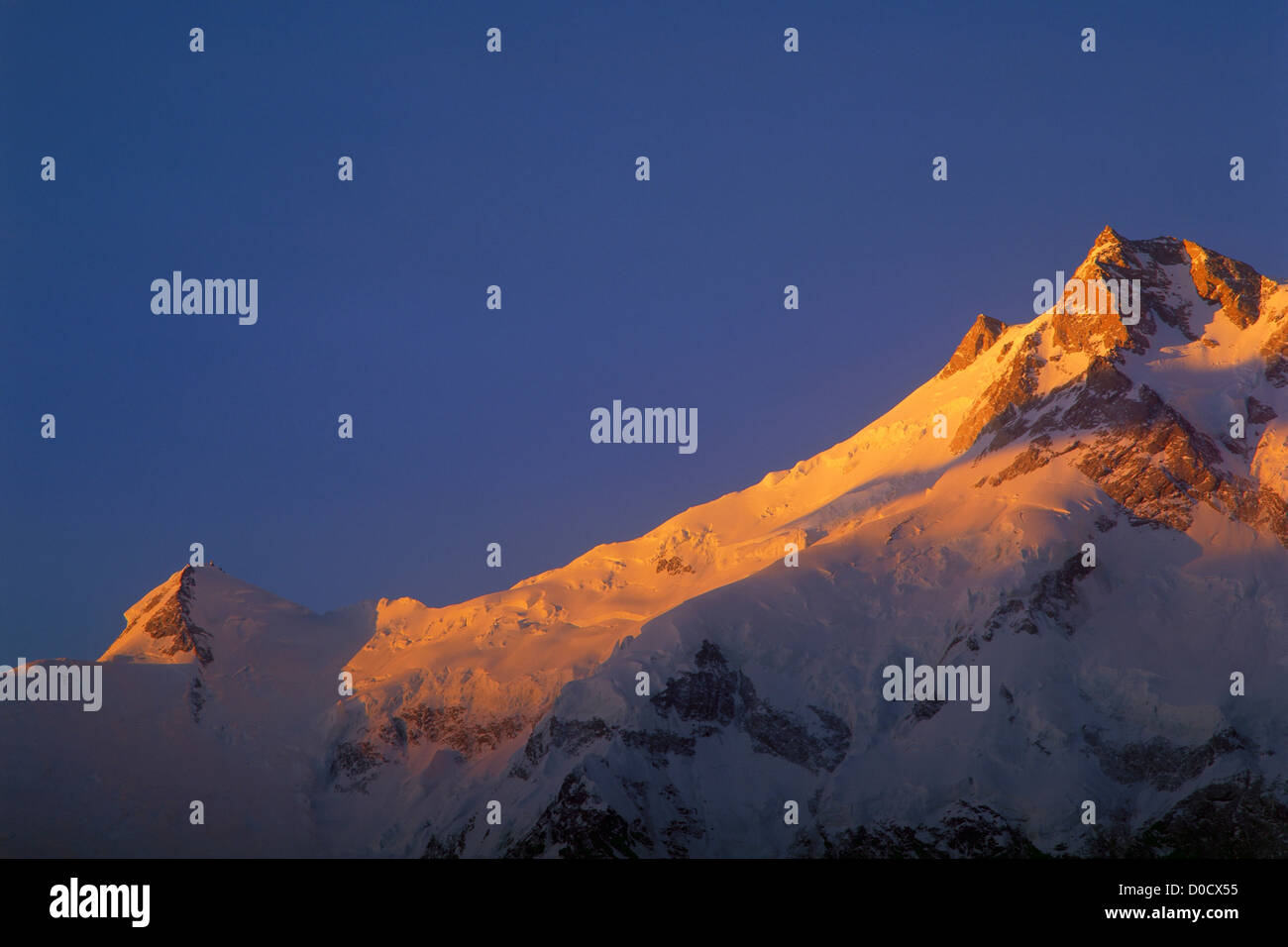 First Light on the Summit Complex of Nanga Parbat Stock Photo - Alamy