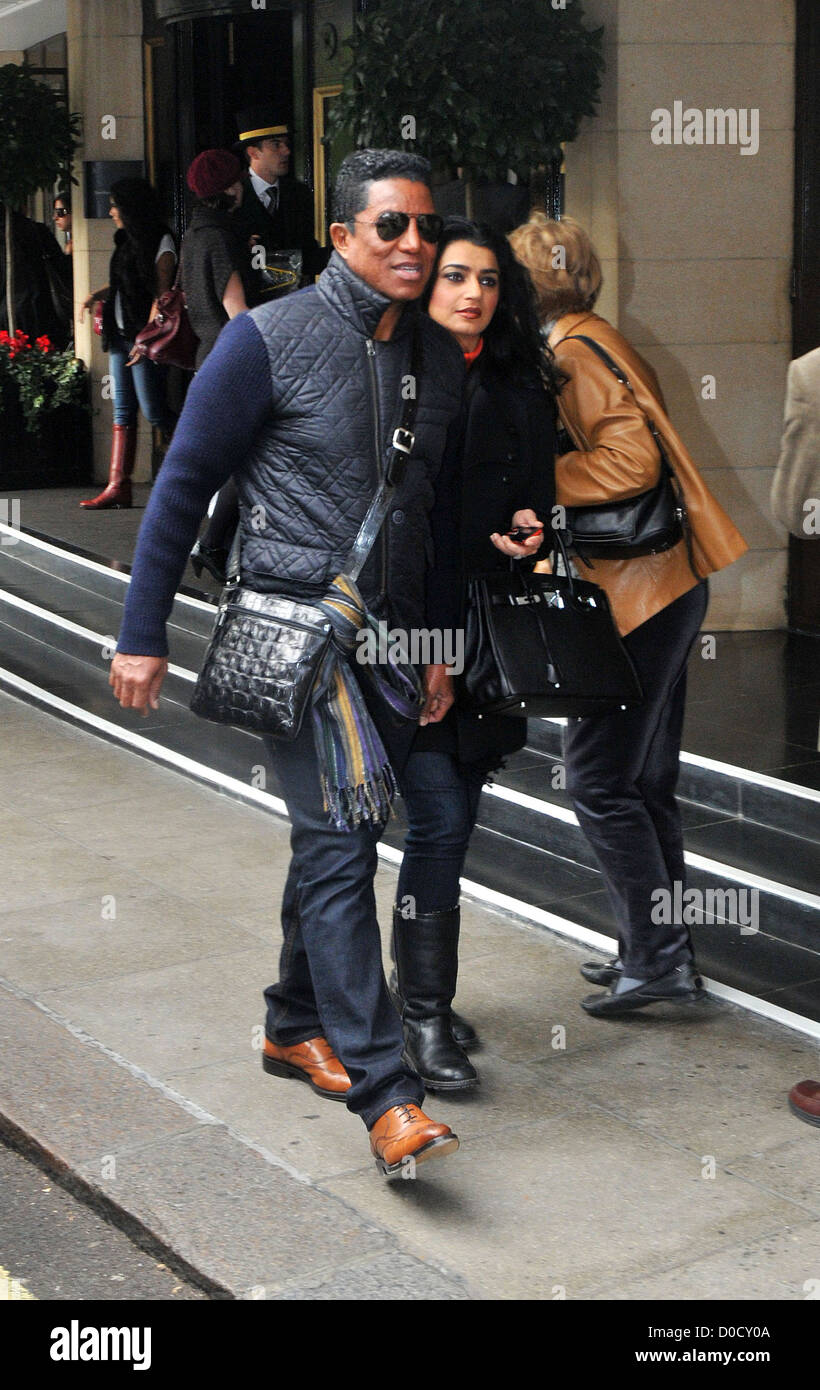 Jermaine Jackson and wife Halima Rashid leaving their hotel and walking ...