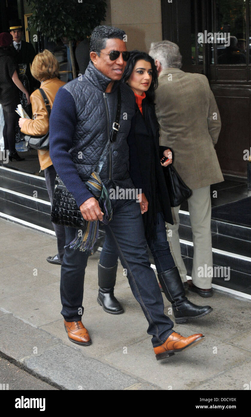 Jermaine Jackson and wife Halima Rashid leaving their hotel and walking ...
