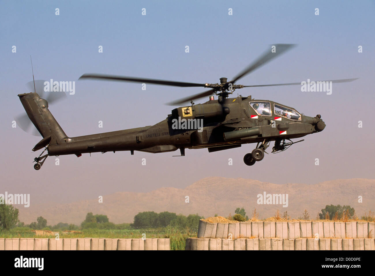 Profile View of the AH-64 Apache Longbow Gunship as It Launches From an ...