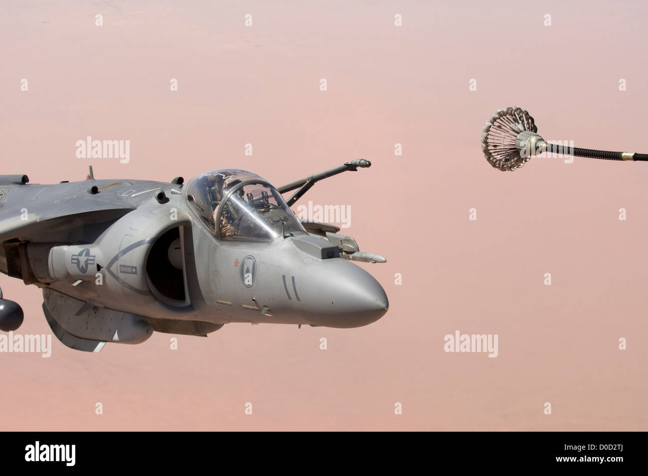 A US Marine Aviator Carefully Maneuvers His AV-8B Harrier Into Position ...