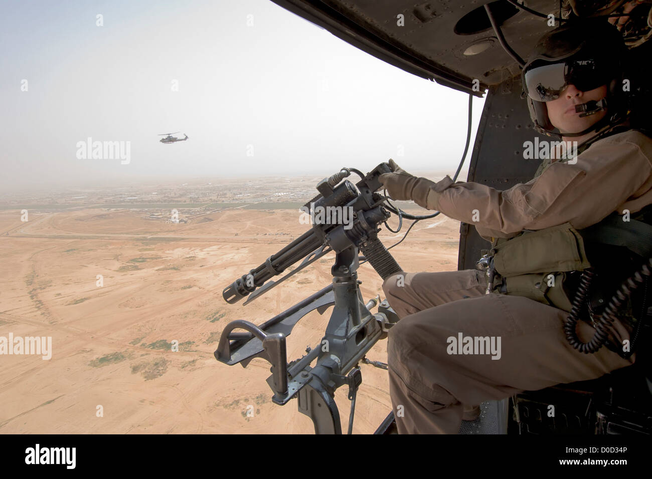 US Marine Mans a High Speed Rotary Gun During a Close Air Support ...