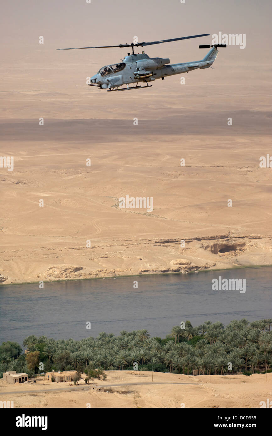 A US Marine Corps AH-1W Super Cobra Flies Above Euphrates River During ...