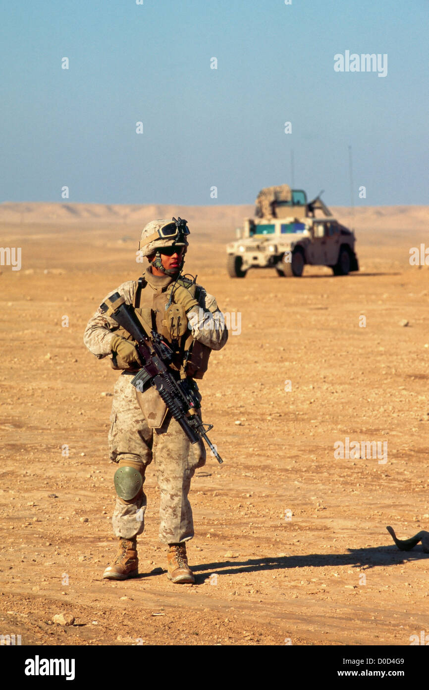 US Marine Patrols the Desert Outside Haditha, in Iraq's Anbar Province ...