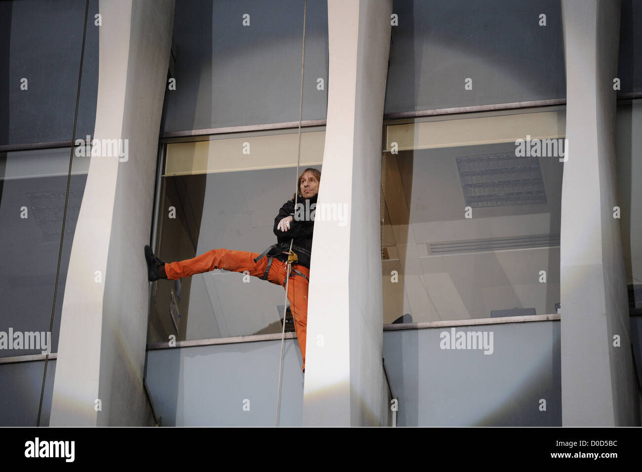 Alain Robert aka "The French Spiderman" climbs the Bollore Direct 8 ...