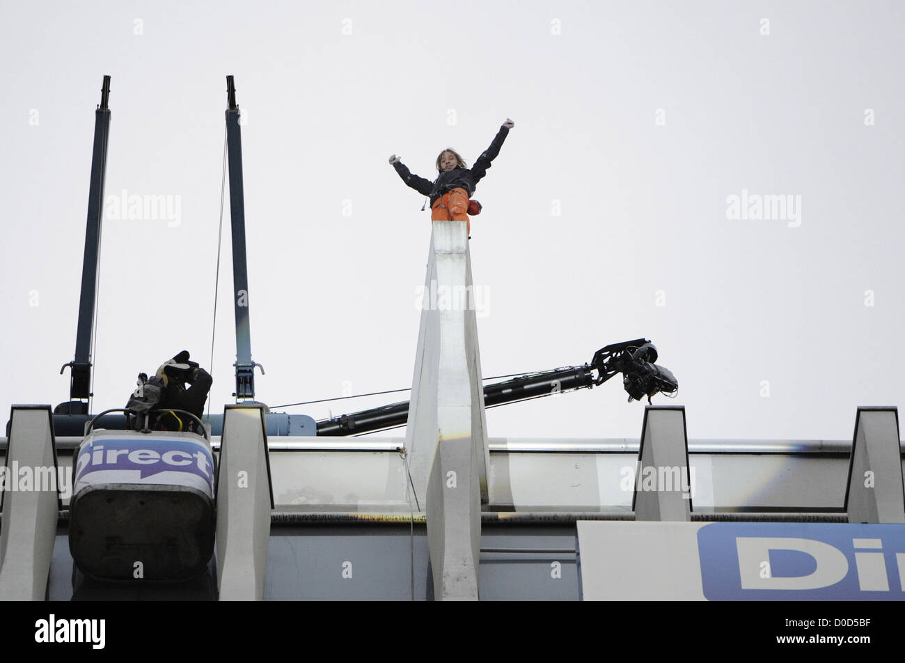 Alain Robert aka "The French Spiderman" climbs the Bollore Direct 8 ...