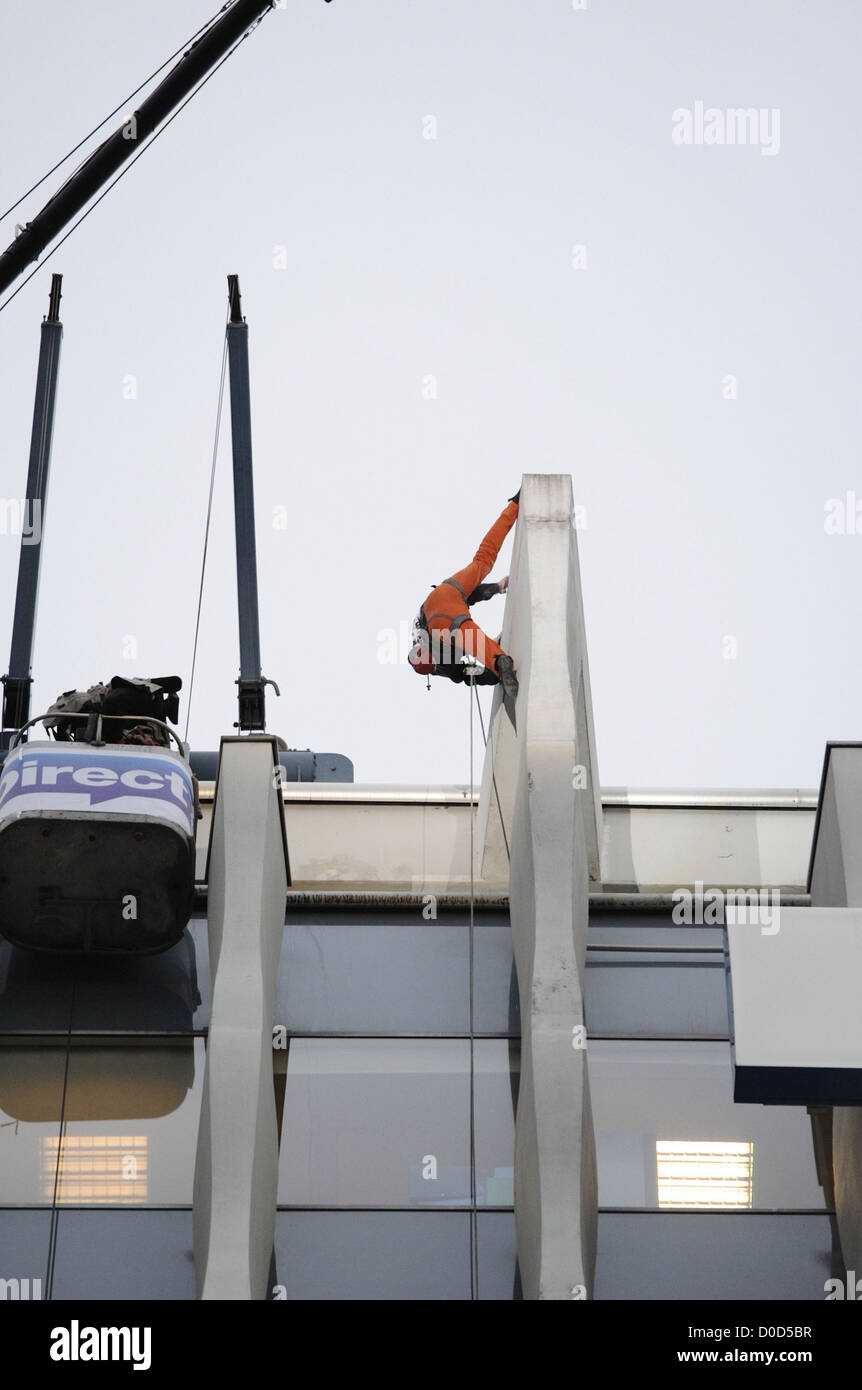 Alain Robert aka "The French Spiderman" climbs the Bollore Direct 8 ...