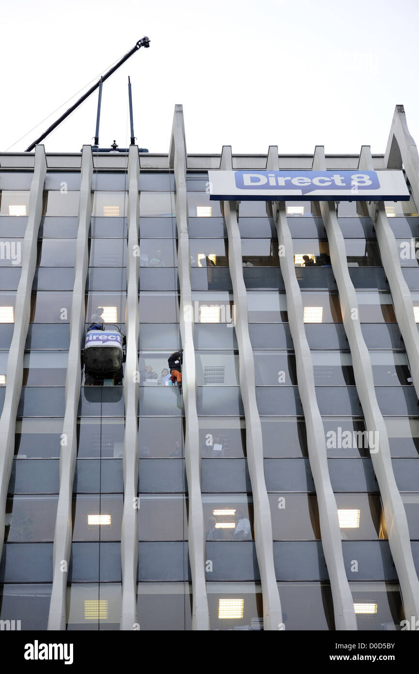 Alain Robert aka "The French Spiderman" climbs the Bollore Direct 8 ...