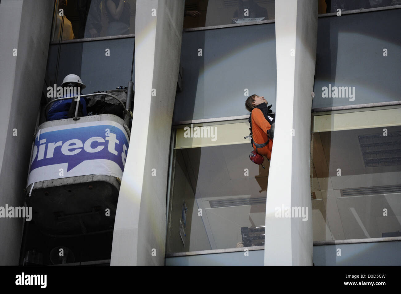 Alain Robert aka "The French Spiderman" climbs the Bollore Direct 8 ...