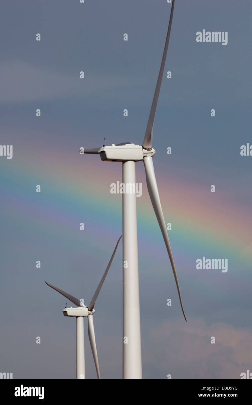 Rainbow and Wind Turbines Stock Photo - Alamy