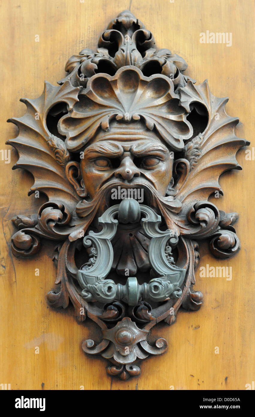 Grotesque head door knockers Florence Tuscany Italy Stock Photo - Alamy