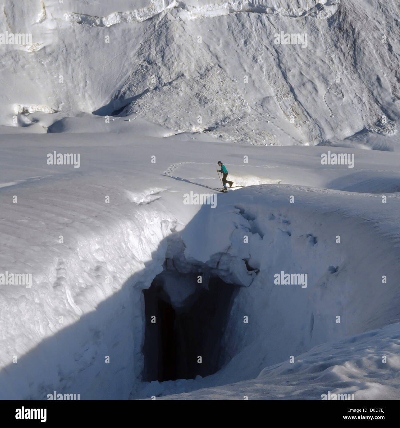 A Ski Mountaineer Crosses a Dangerous Crevasse Stock Photo - Alamy