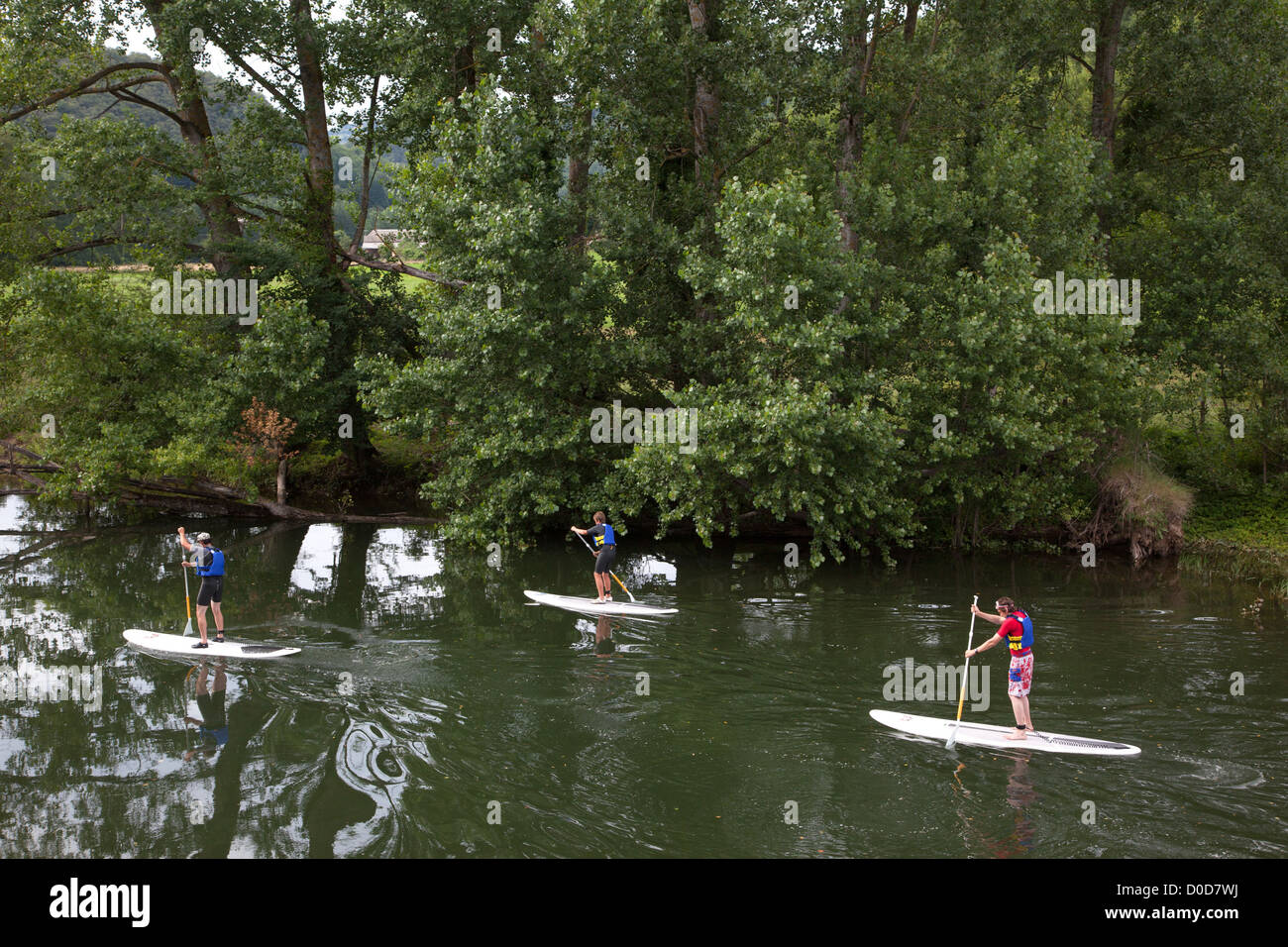 SUP ACTIVITY STAND UP PADDLE GOING DOWN THE LOT RIVER STANDING ON A ...