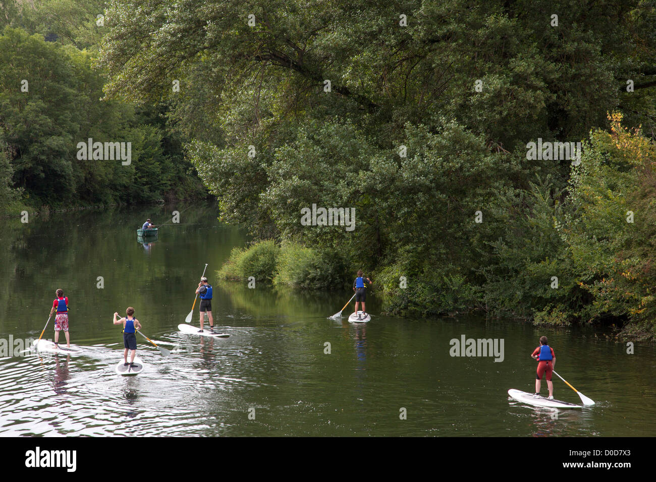 SUP ACTIVITY STAND UP PADDLE GOING DOWN THE LOT RIVER STANDING ON A ...