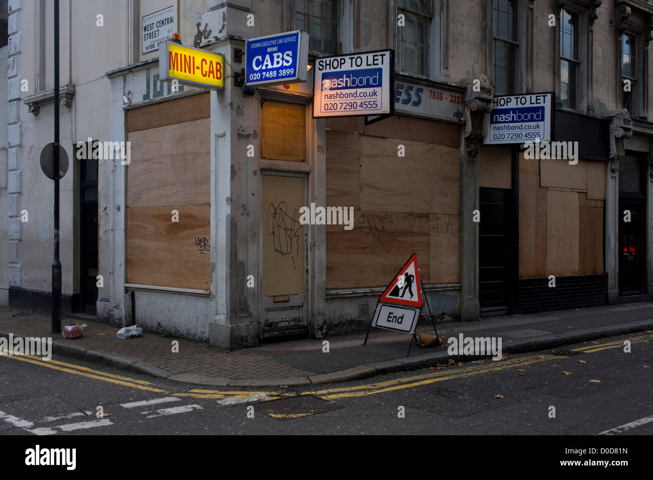 A boarded up central London mini cab business and an End of works ...