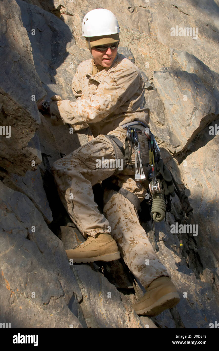A U.S. Marine on a Rock Climbing Course During Mountain Leader Training ...