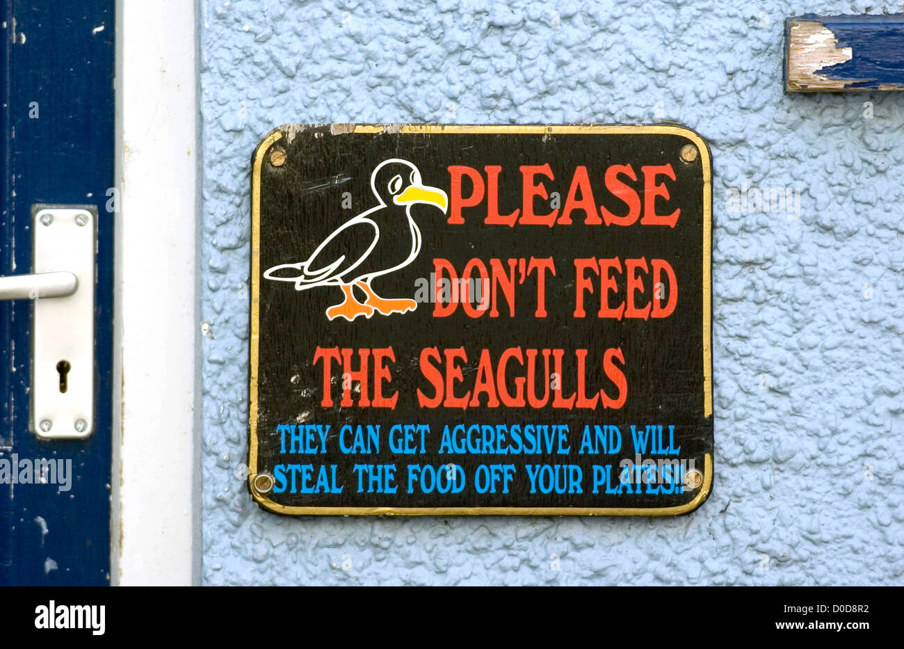 Please don't feed the seagulls sign outside a restaurant in the centre ...