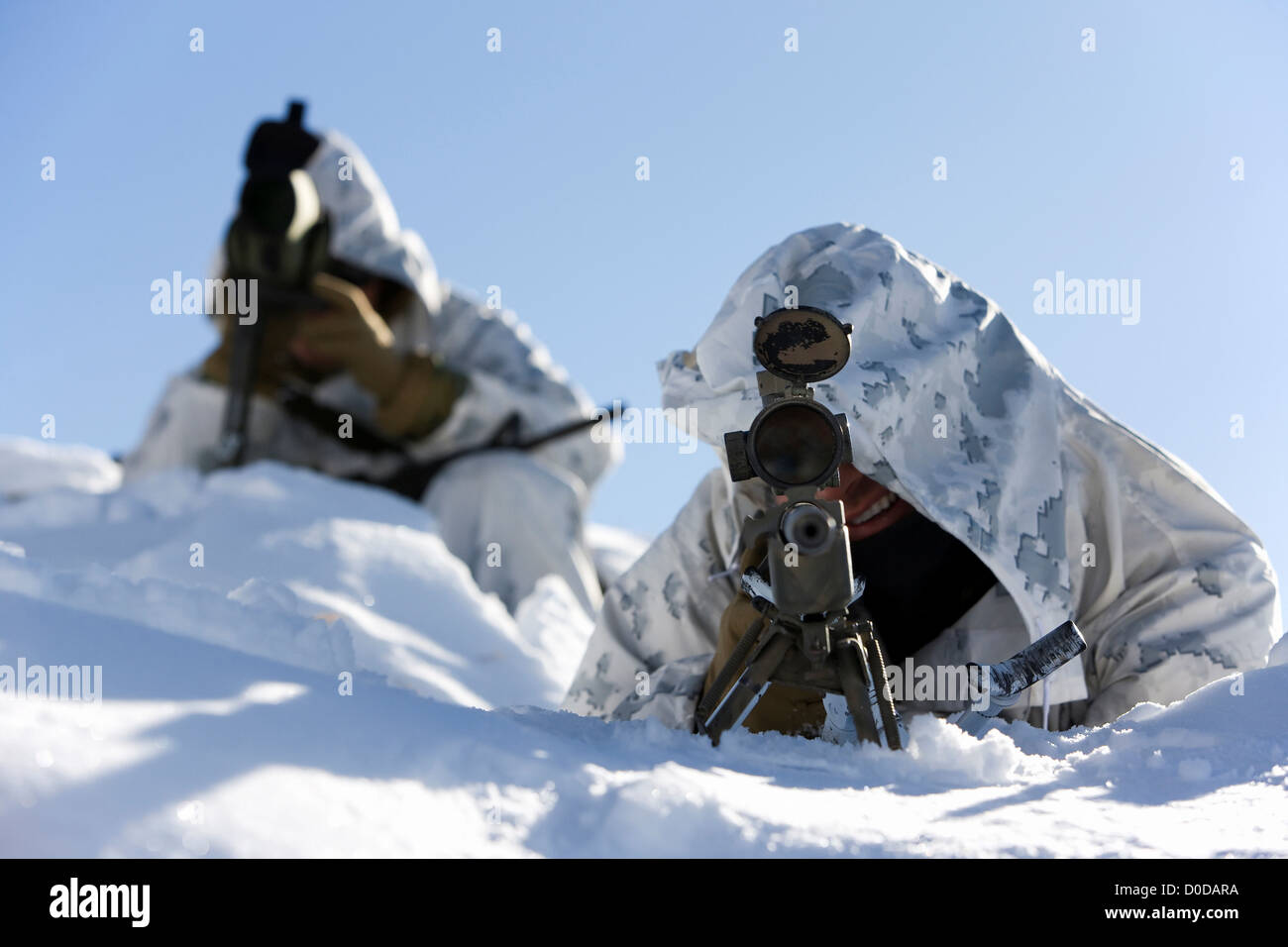 U.S. Marine Corps Scout Sniper and His Spotter, Camouflaged in the Snow ...