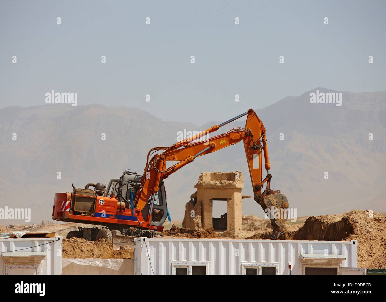 Excavator Preparing a Building Site Stock Photo - Alamy