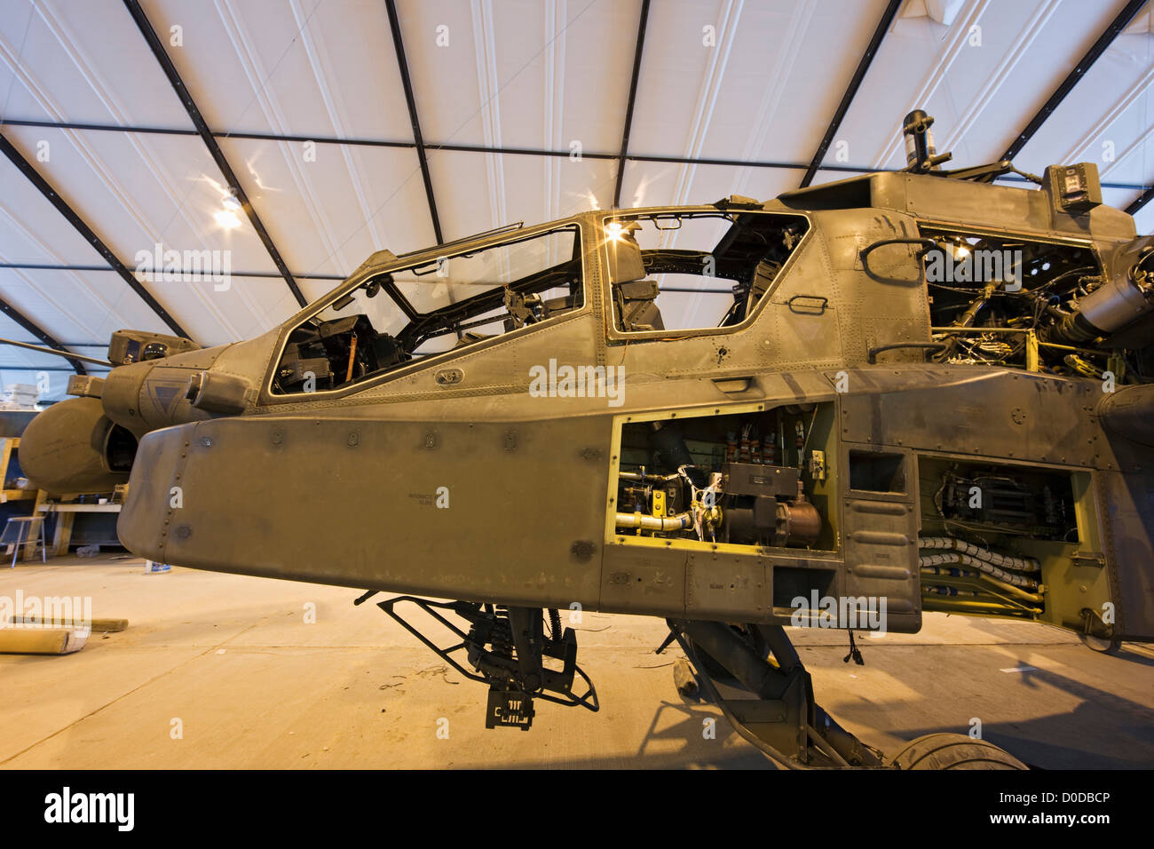 Side View of an AH-64 Apache Helicopter Undergoing Maintenance Stock ...