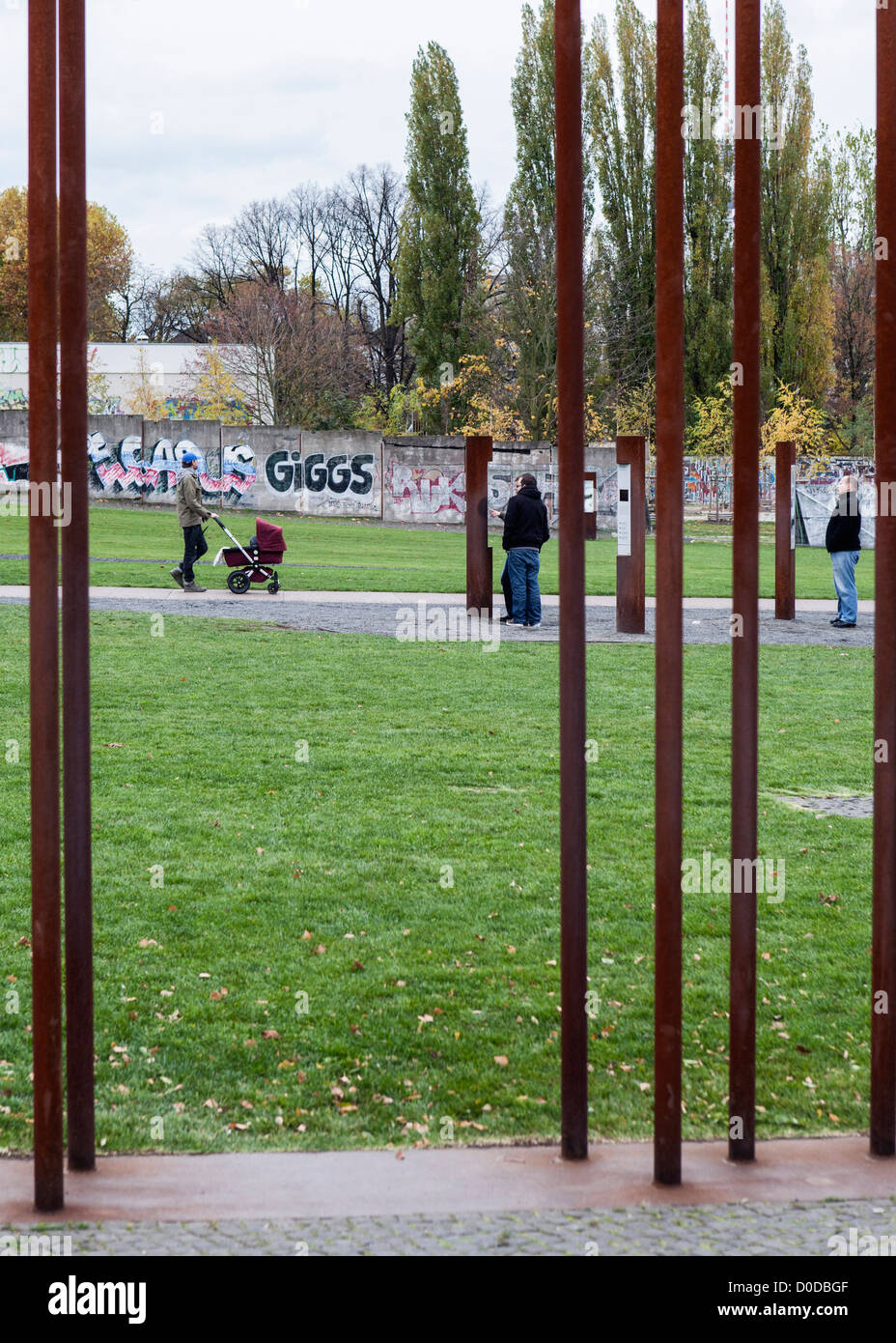 Rusty poles indicate the position of the Berlin Wall at the memorial in ...