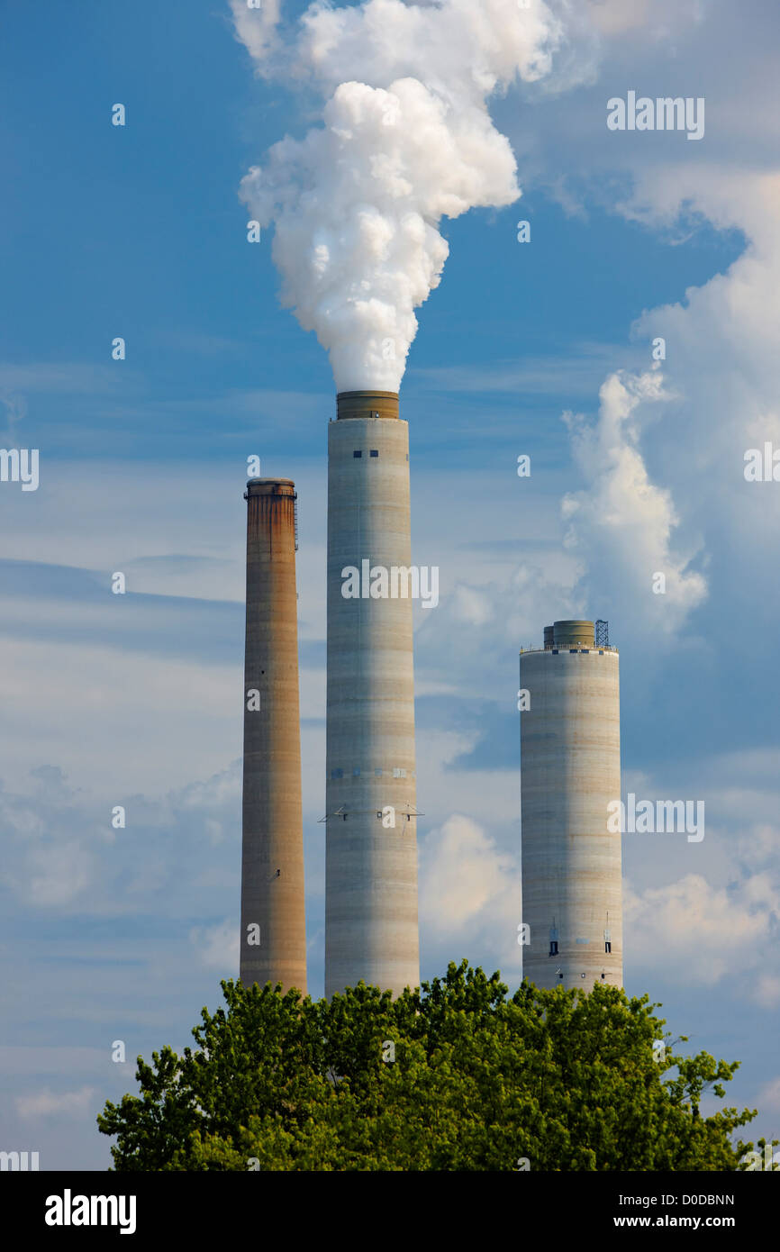 Smokestacks Dumping Steam and Exhaust into the Sky Stock Photo - Alamy