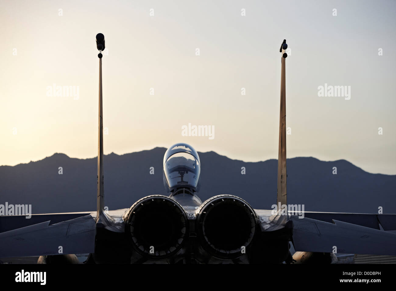 Rear View of F-15E Strike Eagle at Dusk Stock Photo - Alamy