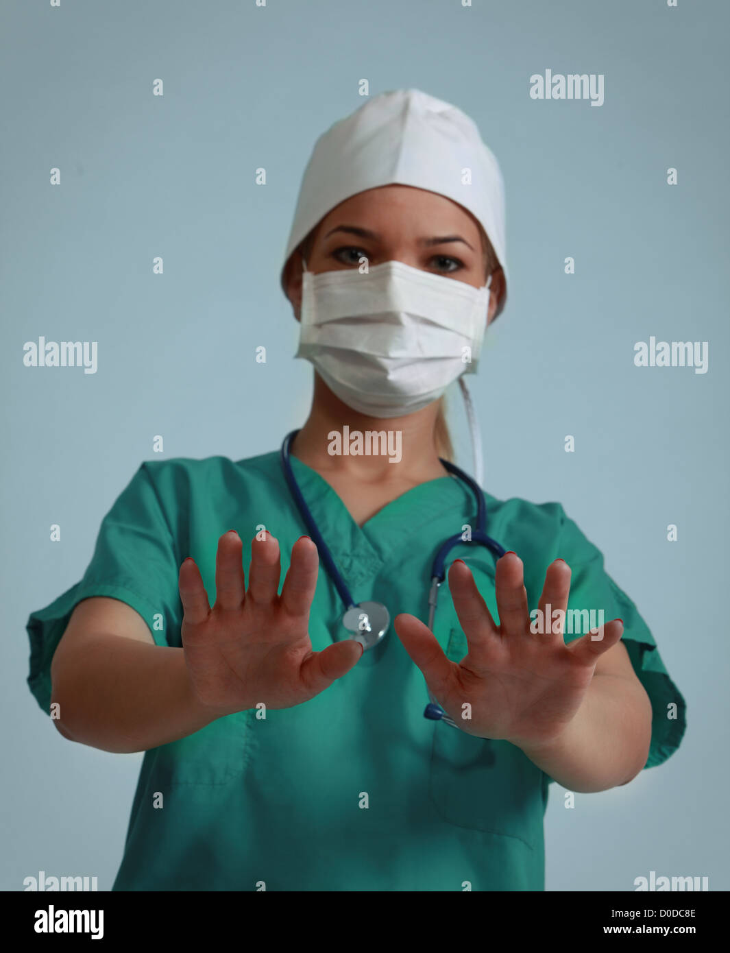 Image of a female doctor preparing to palpate a patient. Selective ...