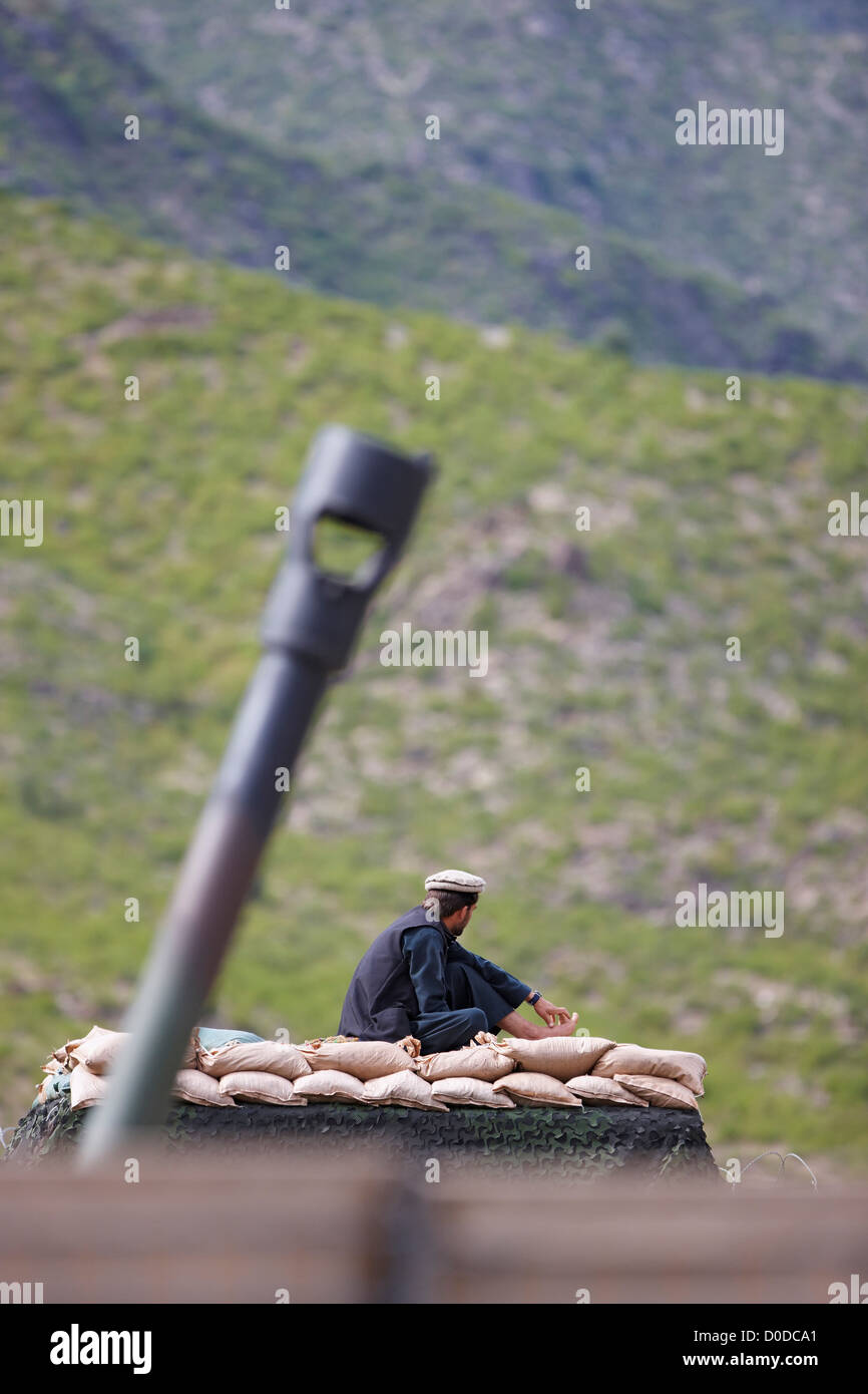 Afghan Man in Traditional Pashtun Outfit Atop Sandbagged Wall Stock ...
