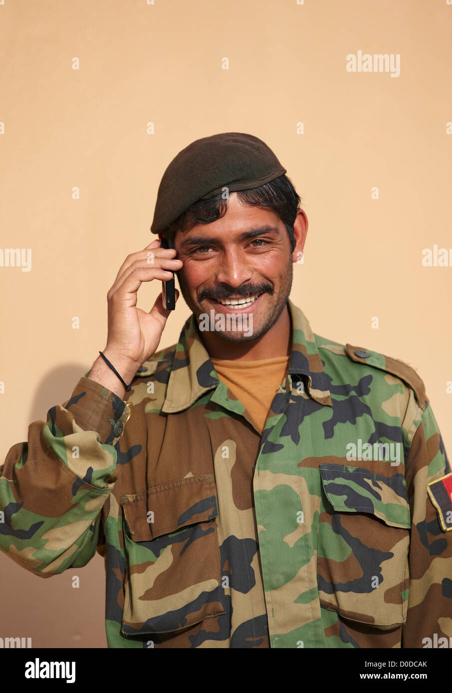 Afghan National Army Soldier Speaks Into a Cell Phone Stock Photo - Alamy