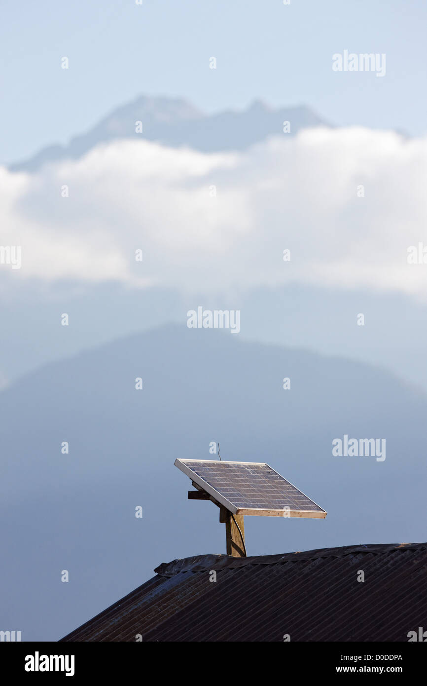 A small solar panel on a rooftop in eastern Nepal Stock Photo - Alamy