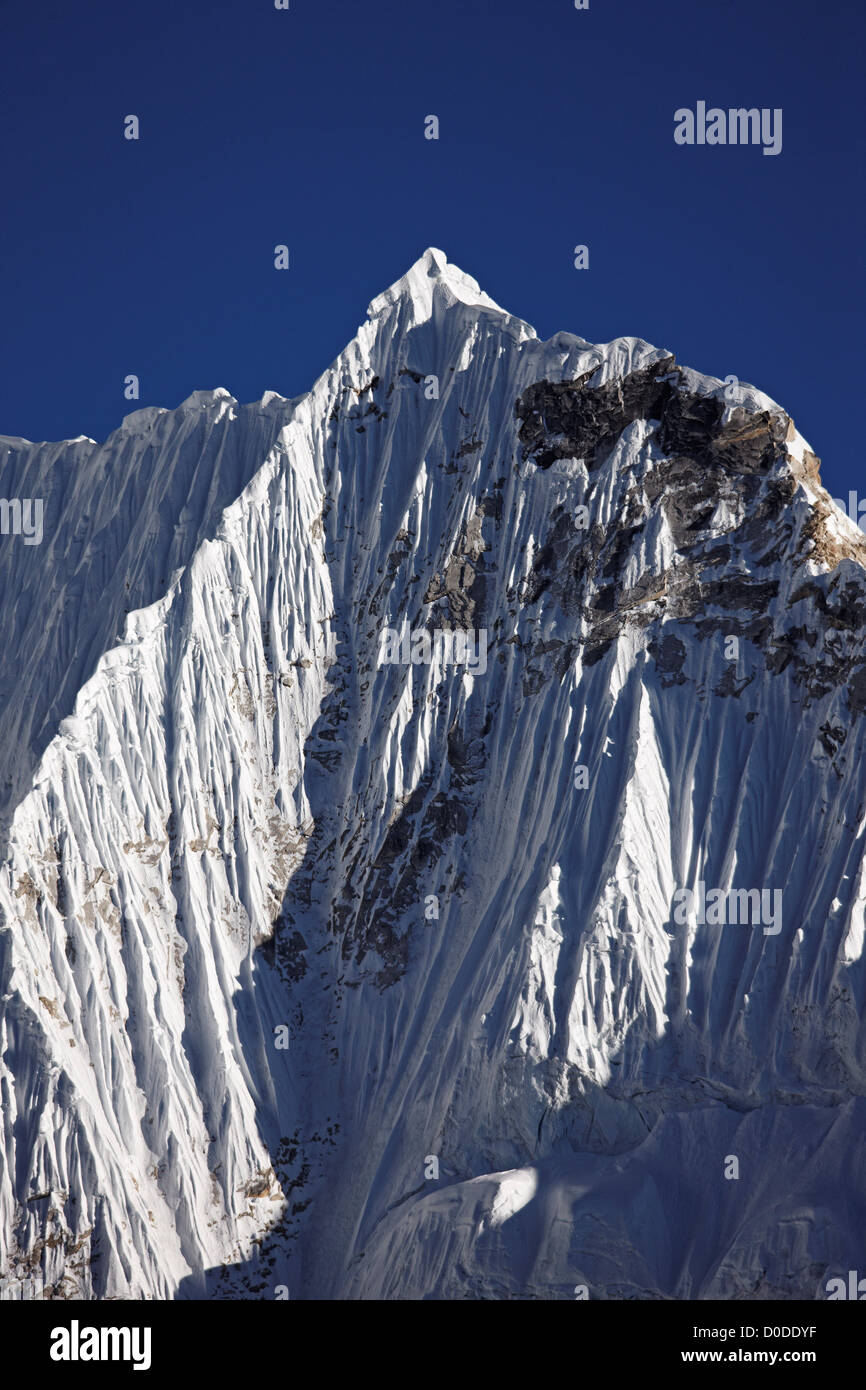 Steep, fluted ridges on Nuptse, in the Everest region of Nepal Stock ...