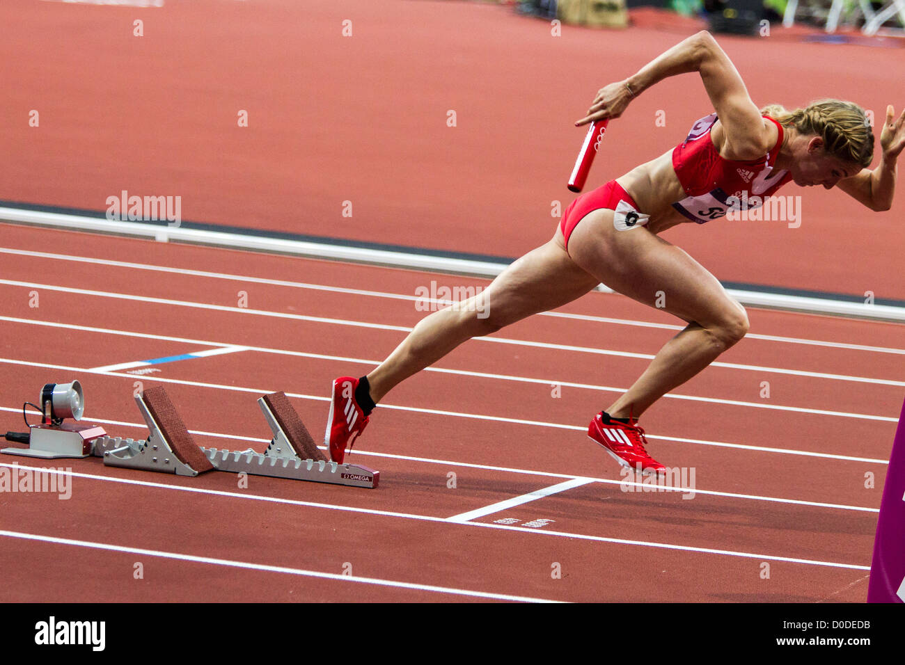 Michelle Cueni (SUI) competing in round 1 of the Women's 4 X 100m relay ...