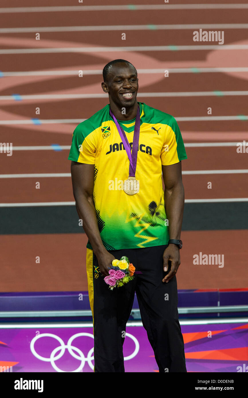 Usain Bolt (JAM) with his gold medal for winning Men's 200m Final at ...