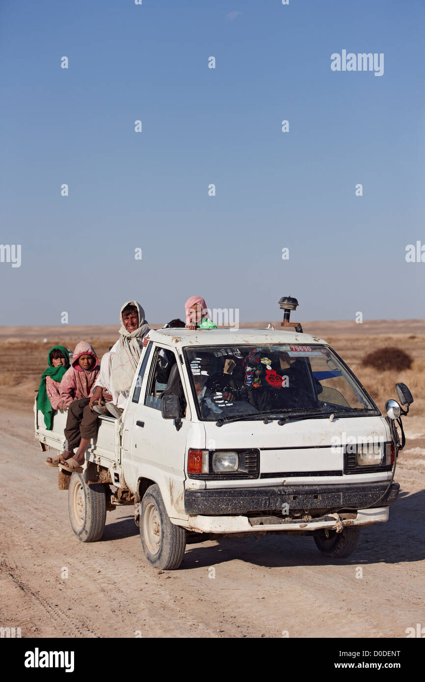 A Kia Bongo truck carrying local Afghans in Afghanistan's southern ...