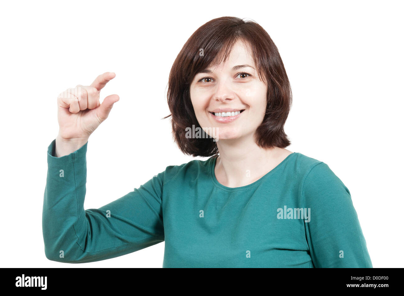 Beautiful woman showing small thing gesture against a white background ...