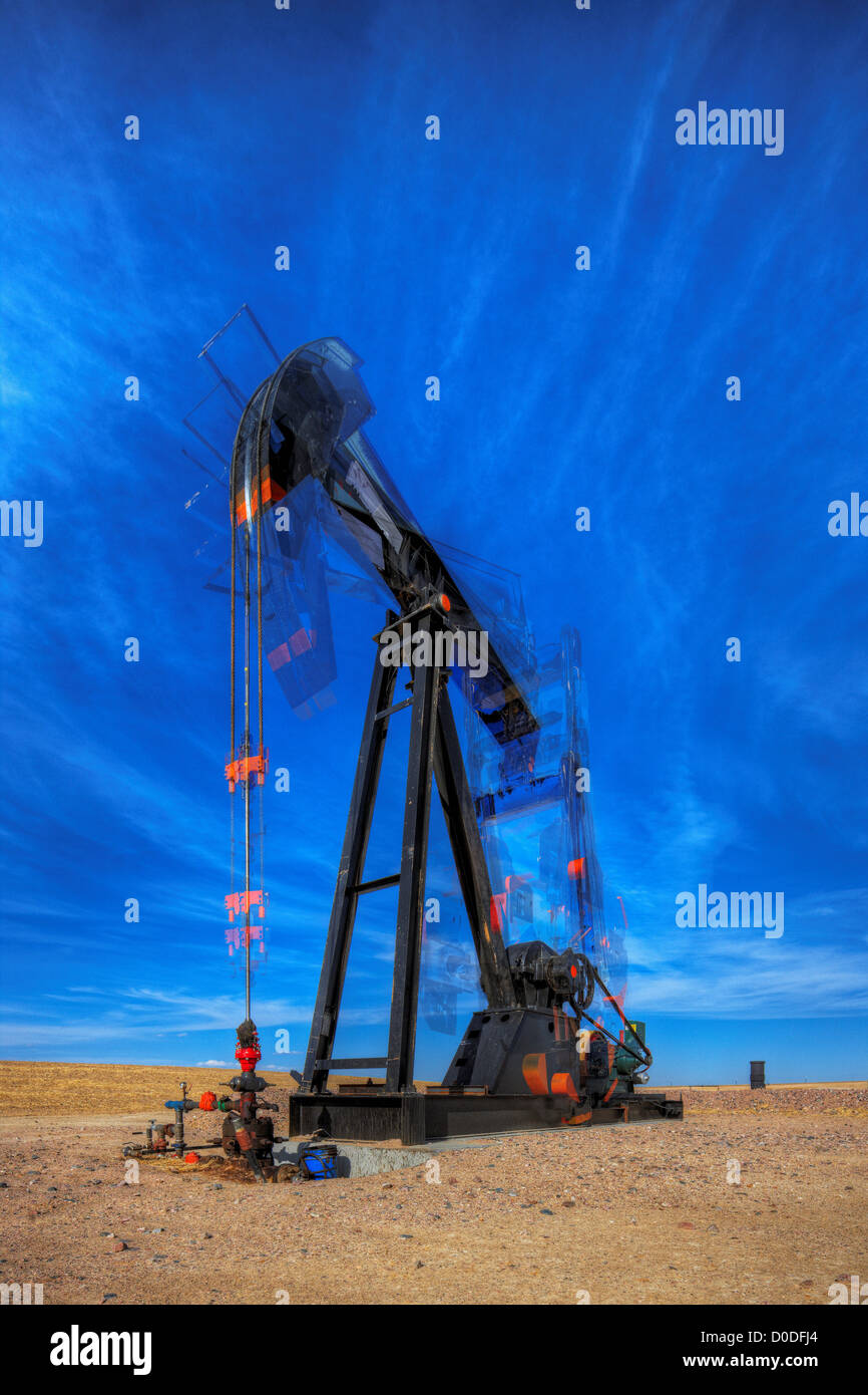 A high dynamic range or HDR image oil well pump jack in northeastern ...