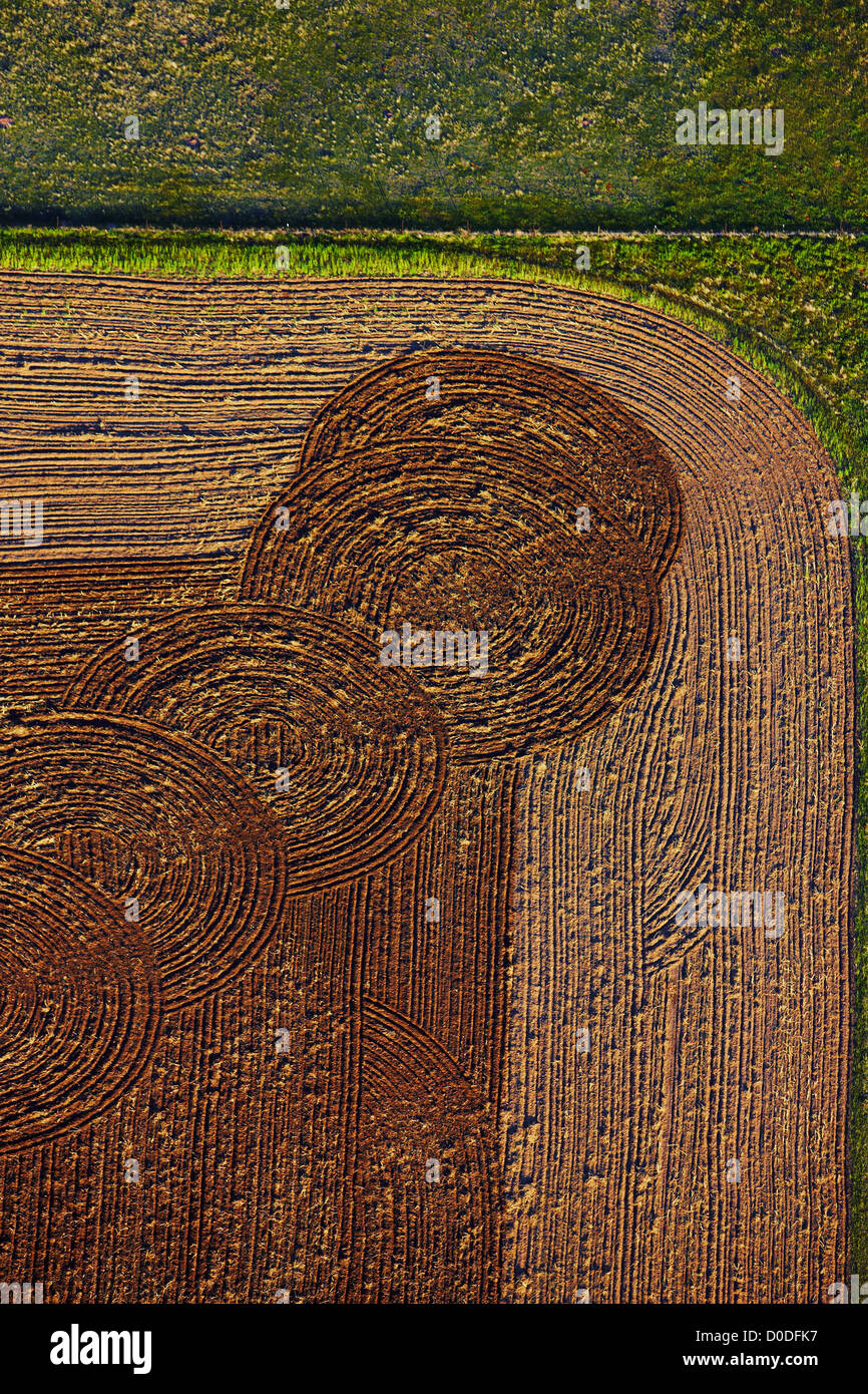 An aerial view of farm land, with circular plow lines, on the eastern ...