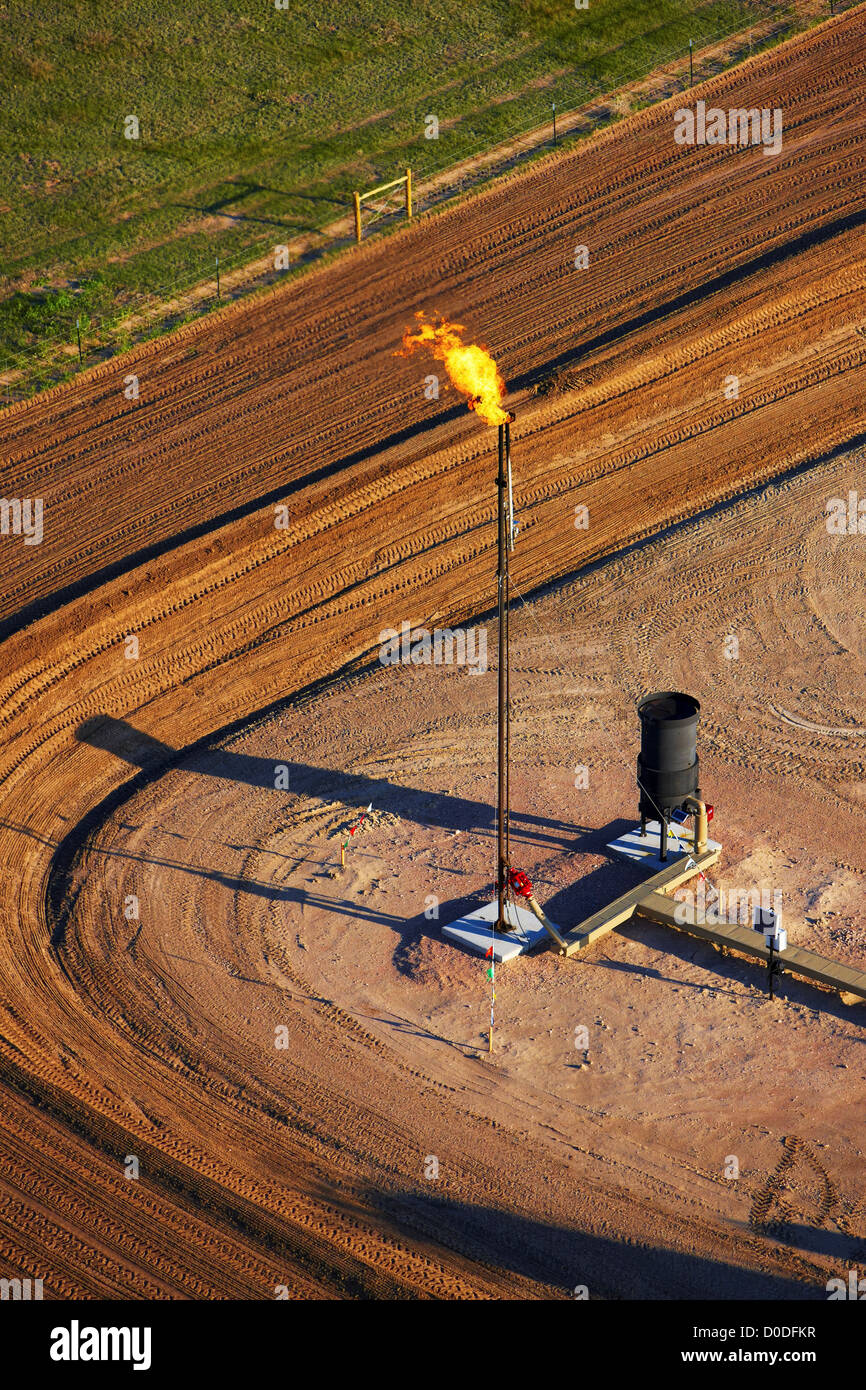 An aerial view of a flare stack, which releases excess natural gas, on ...