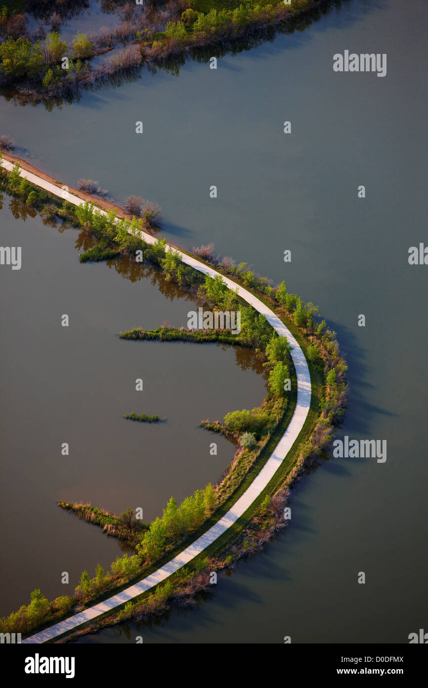 An aerial view of elevated walkway curving through a lake in Colorado ...