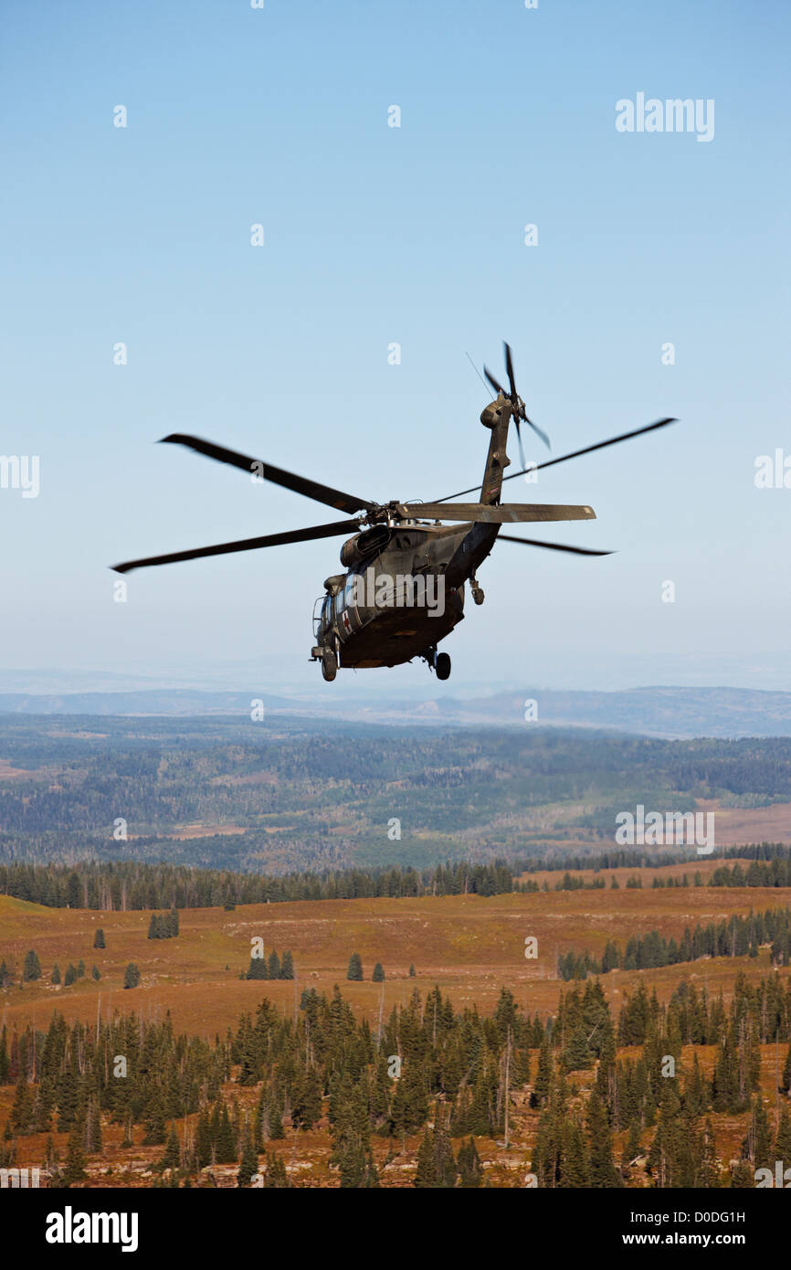 A Sikorsky UH-60 Blackhawk helicopter above Colorado's Rocky Mountains ...