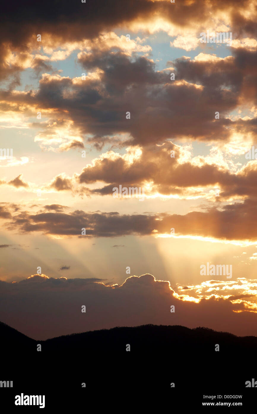 Crepuscular rays at sunset Stock Photo - Alamy