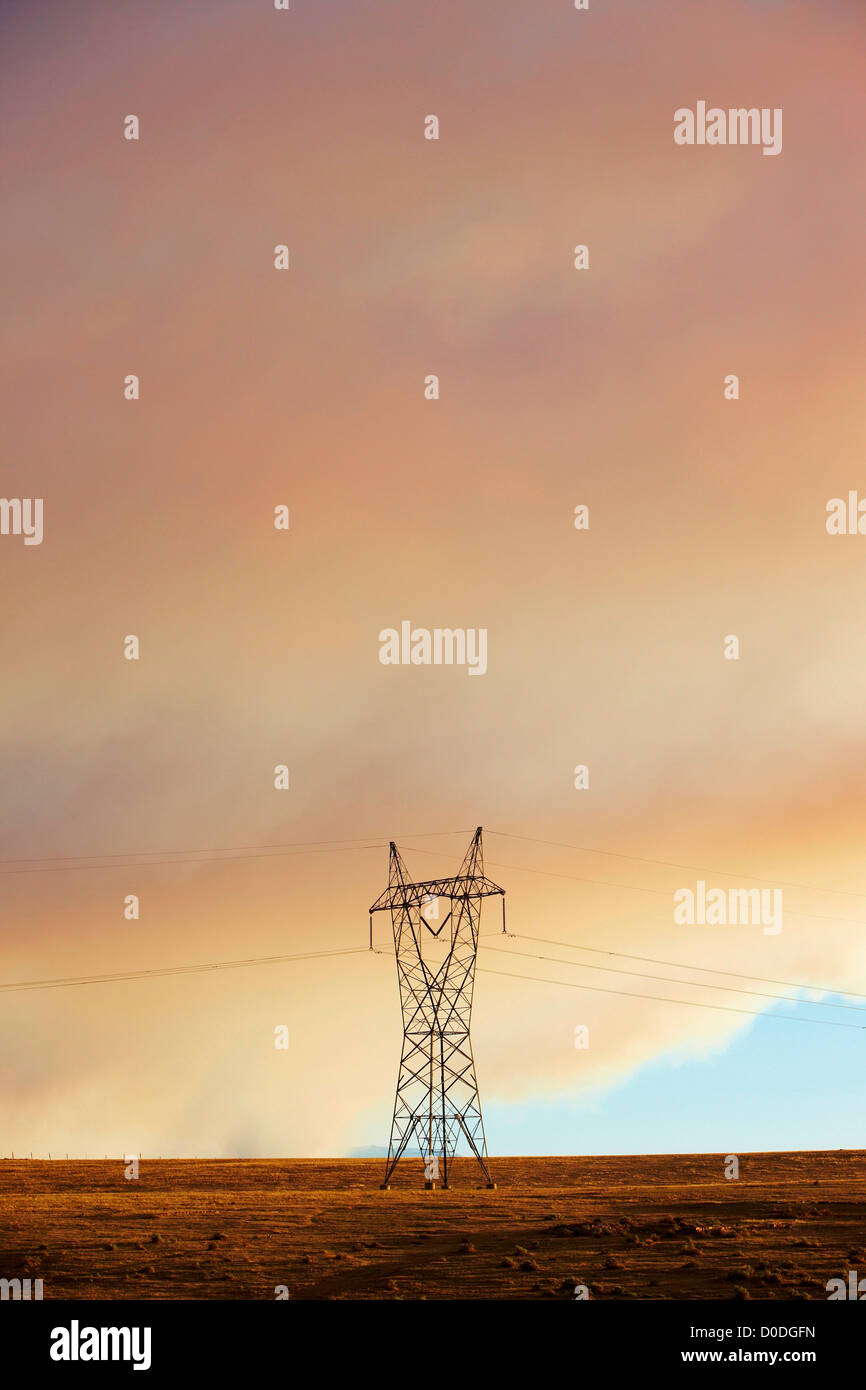 High voltage power line, smoke from raging mountain wildfire, Colorado ...