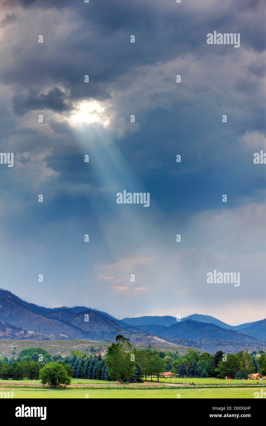 Dense beam of light, a group of crepuscular rays, Colorado, USA Stock ...