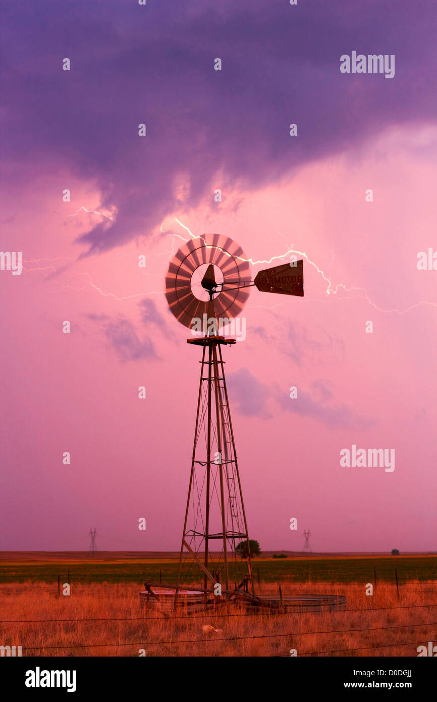 Lightning and lone windmill, eastern plains of Colorado, USA Stock ...